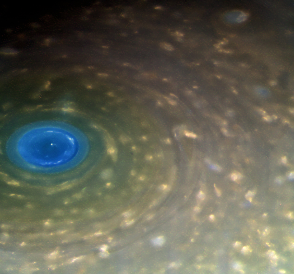 There’s a Cerulean Storm Swirling on Saturn’s North Pole – Lights in ...