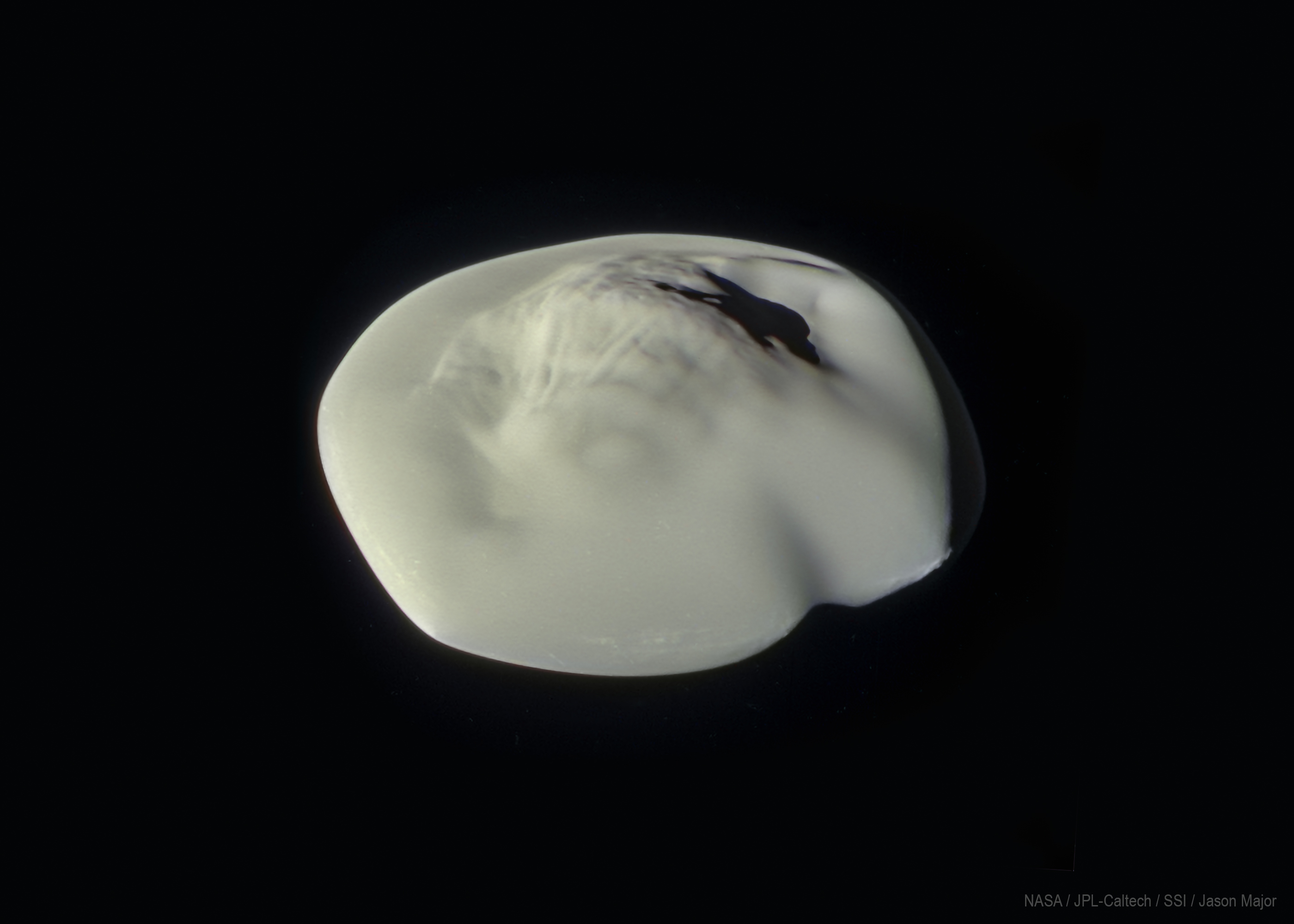 Saturn’s Moon Atlas is Literally a Flying Saucer – Lights in the Dark